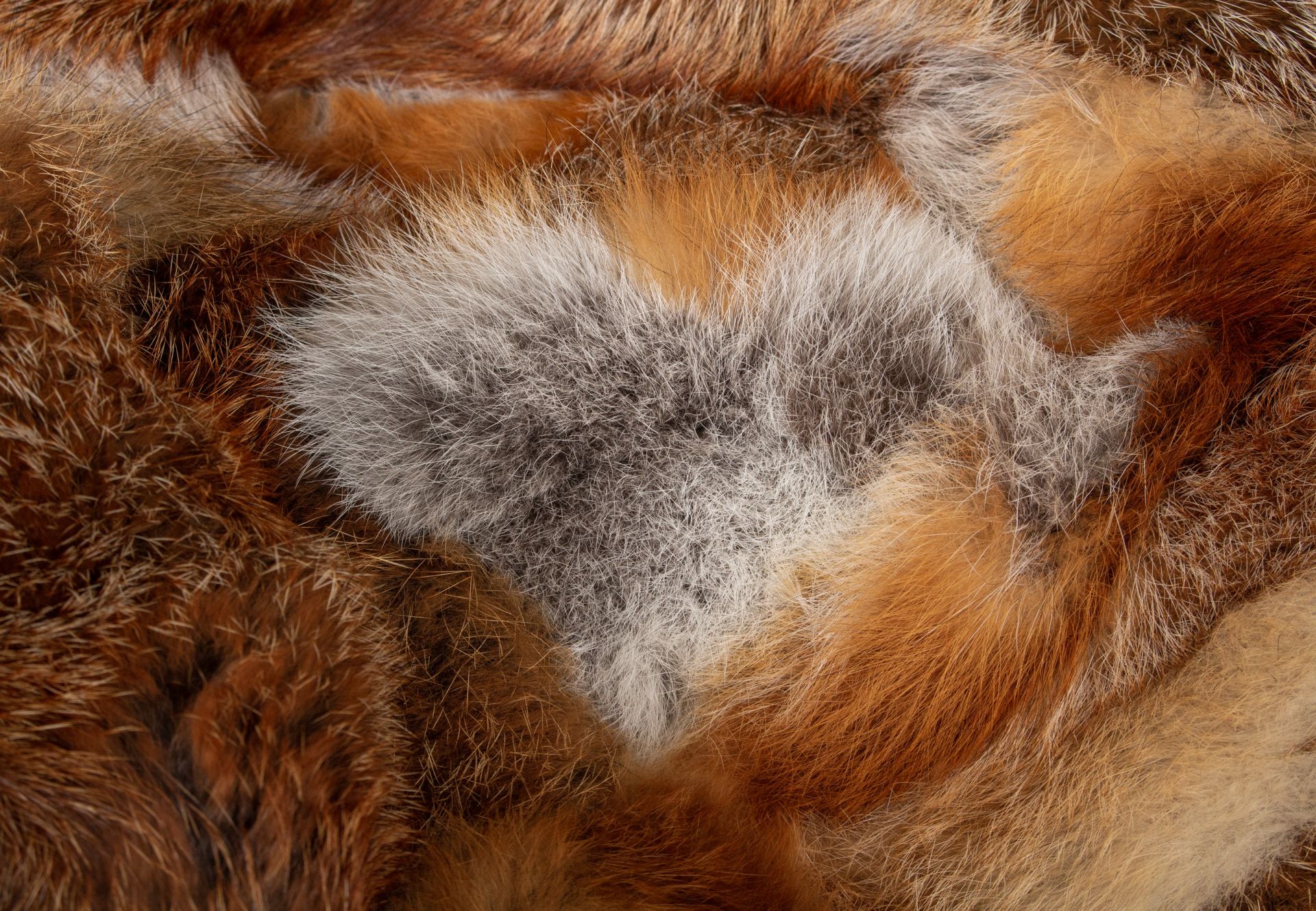 Elegant red fox fur blanket with an extravagant design